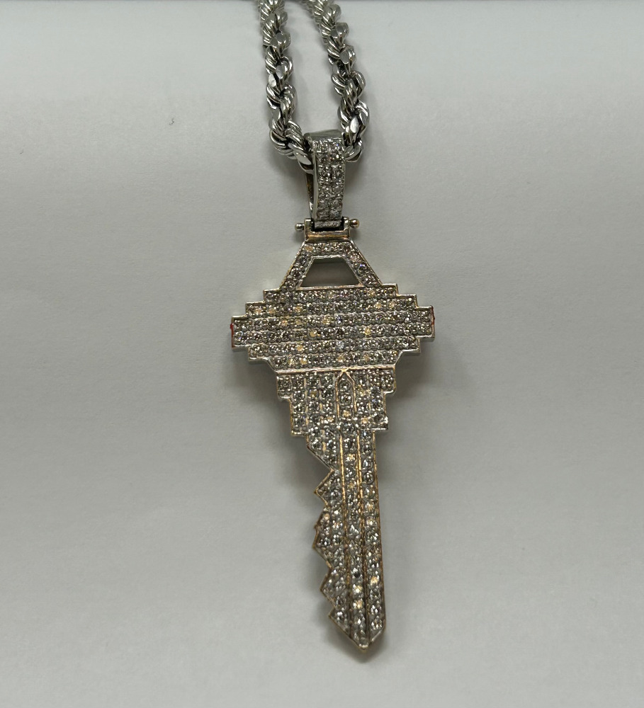 (1) 14K & Diamond Necklace & Key Pendant